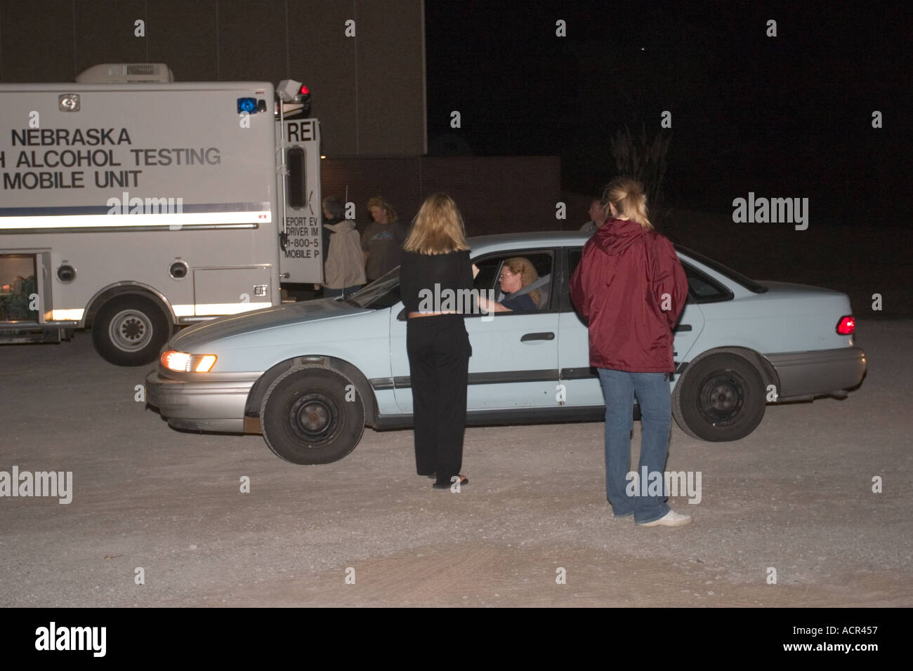 MADD Mothers Against Drunk Driving volunteers handing out information ...