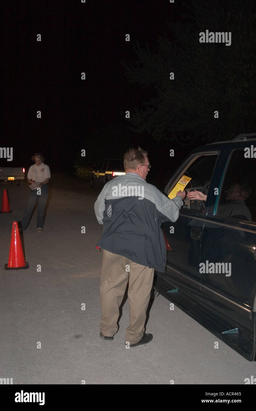 MADD Mothers Against Drunk Driving volunteers handing out information ...