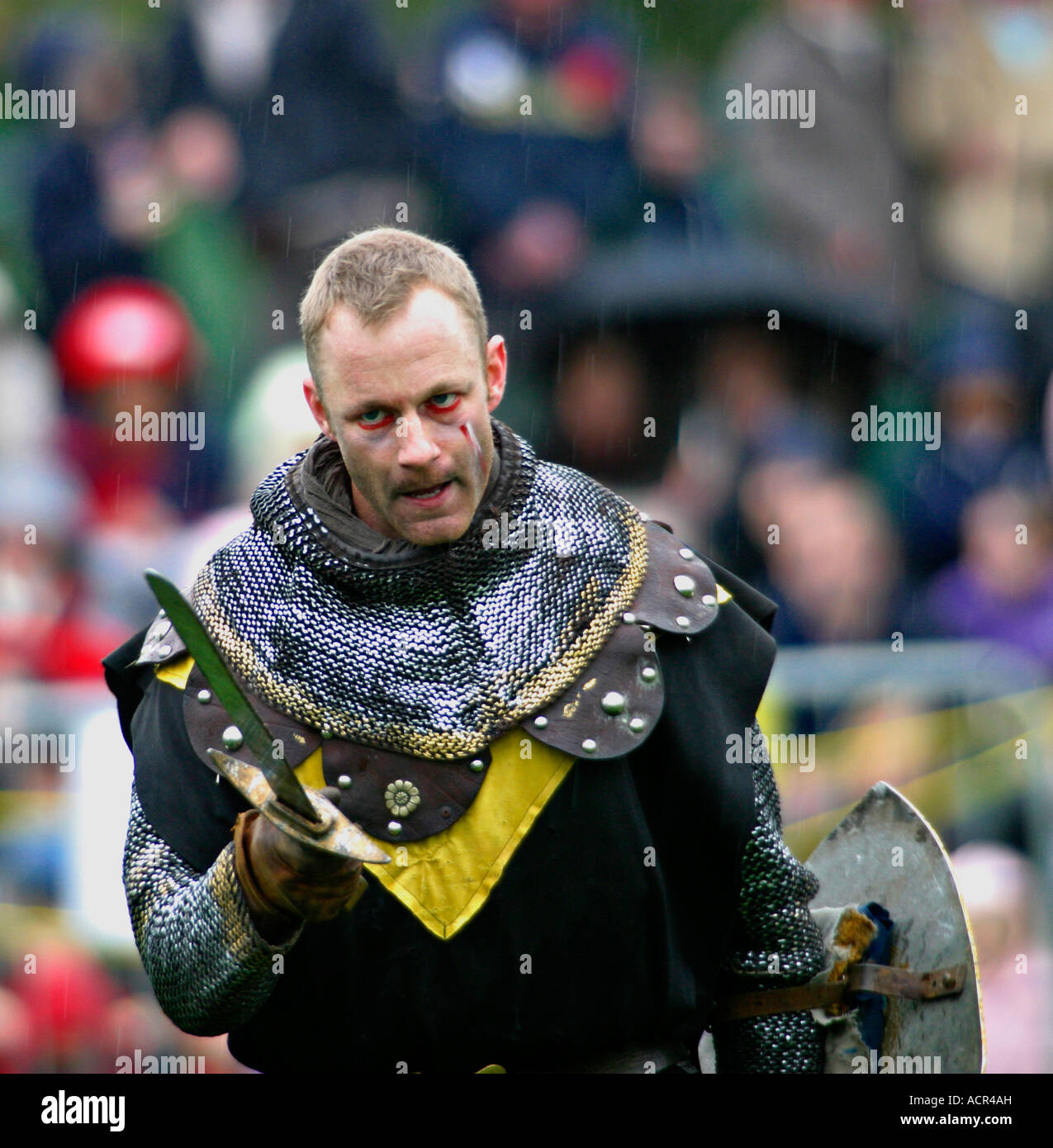 Men at arms re-enacting a sword fight during the Robin Hood Pageant at ...
