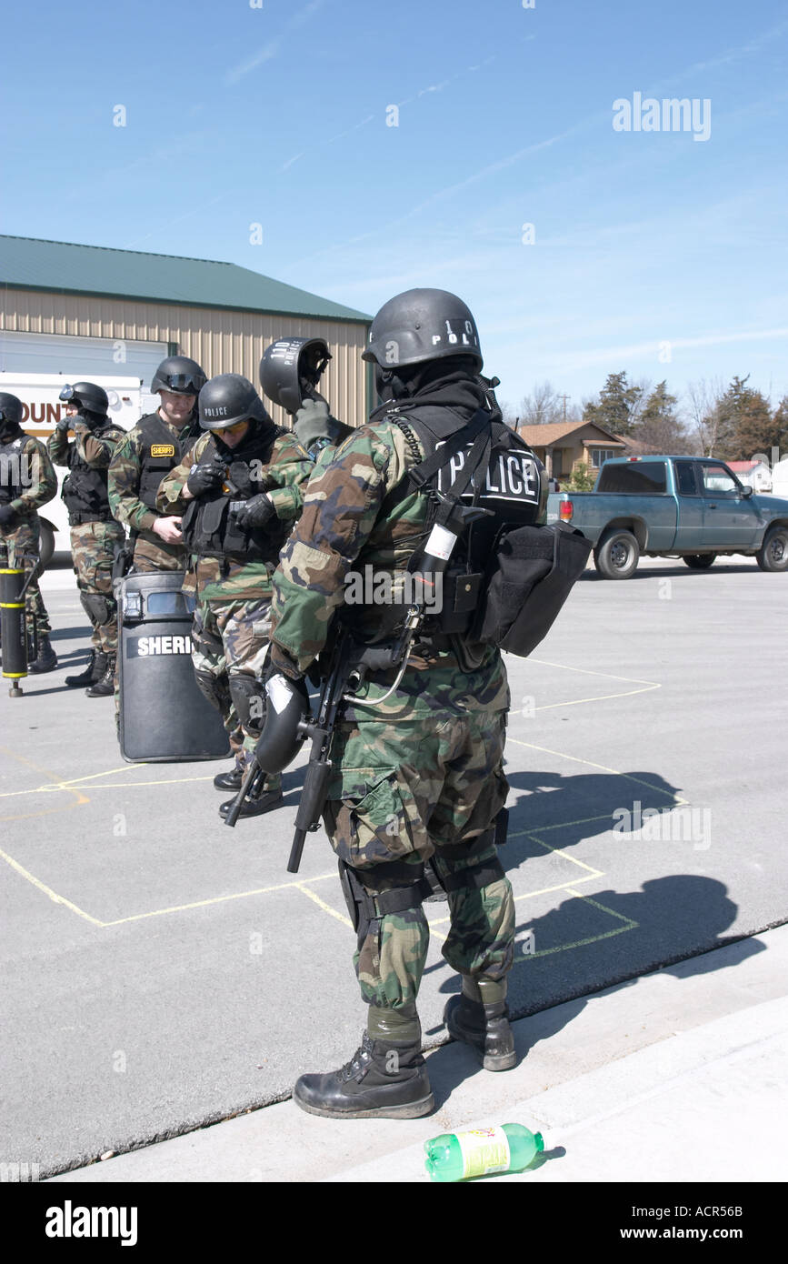 SWAT Officer with non lethal weapon Stock Photo - Alamy