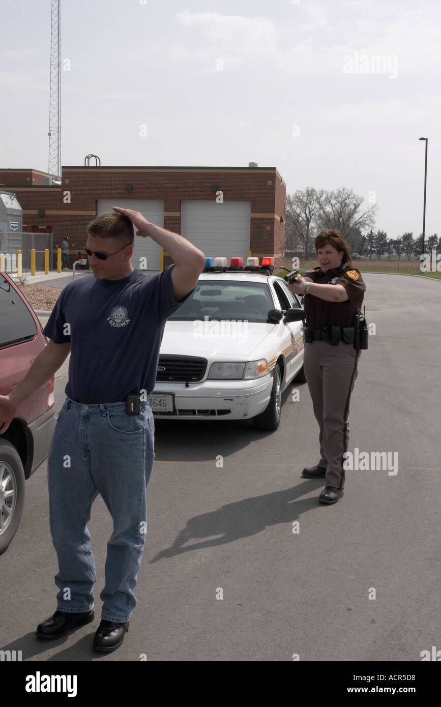 Felony traffic stop. Female deputy sheriff stopping motorist (training ...