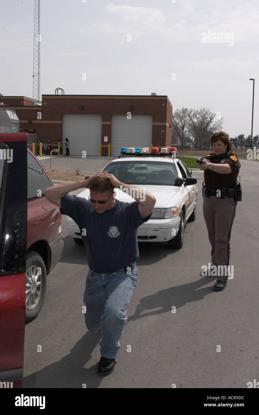 Felony traffic stop. Female deputy sheriff stopping motorist (training ...