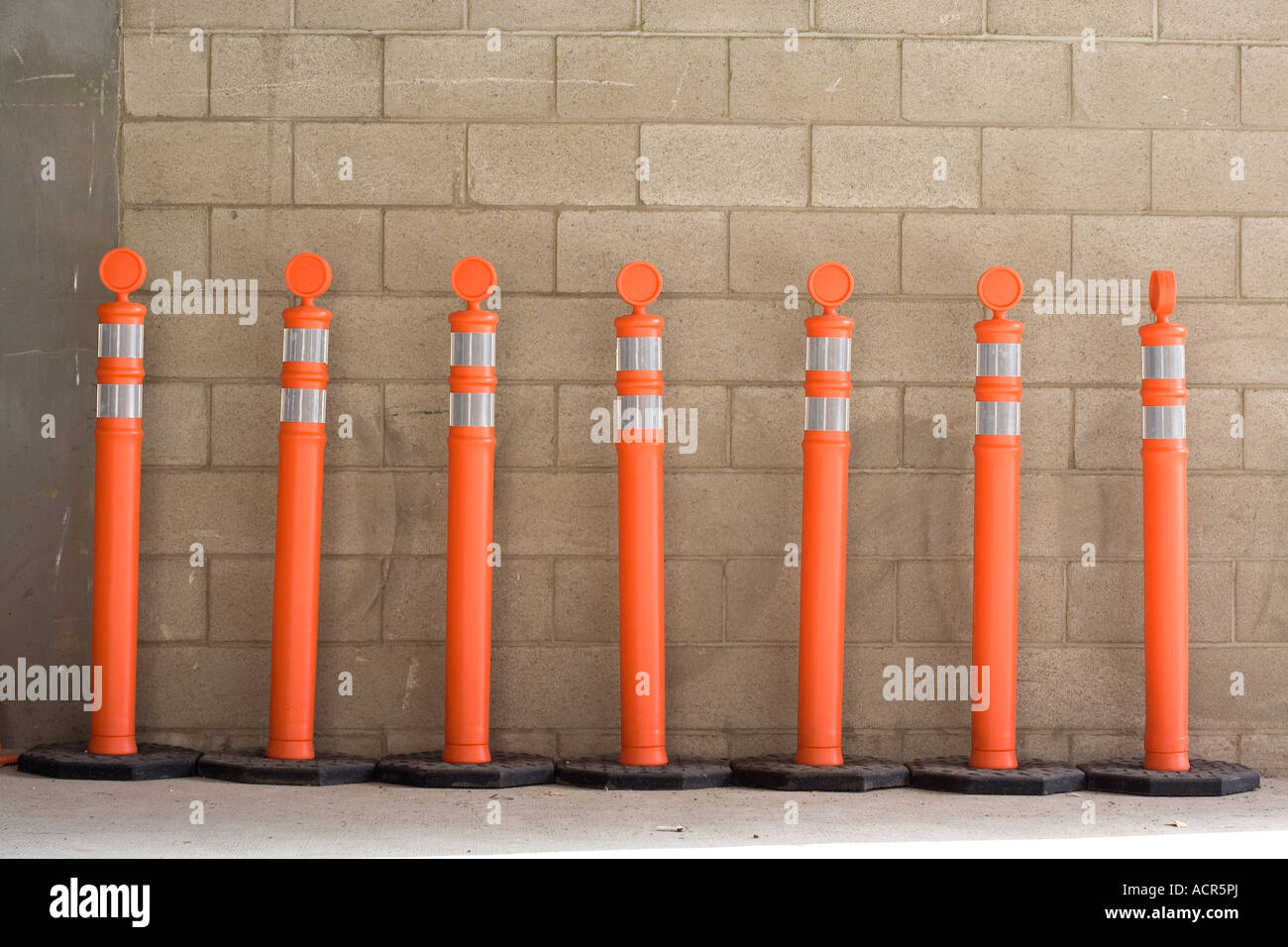 orange traffic posts Stock Photo - Alamy