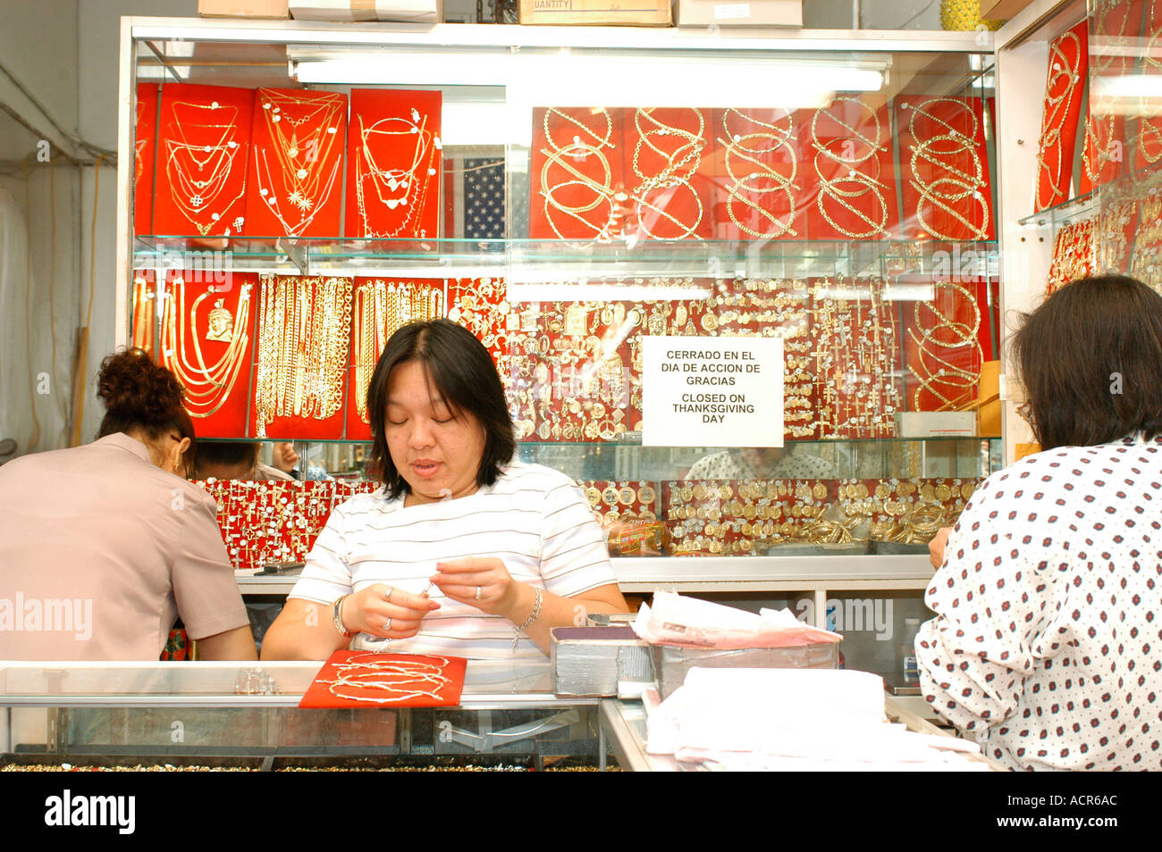 Workers and customers in jewelry store in Chinatown Stock Photo - Alamy