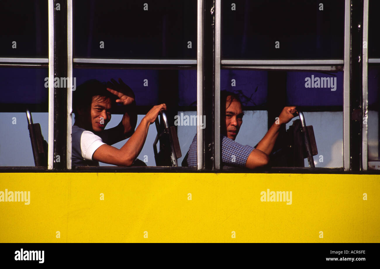 Happy bus passengers Manila Philippines Stock Photo - Alamy