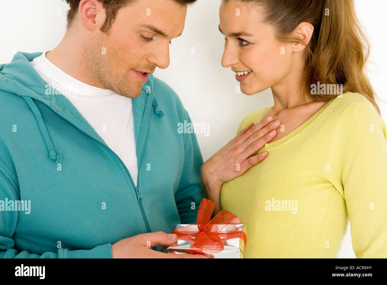 2 gifts hand hi-res stock photography and images - Alamy