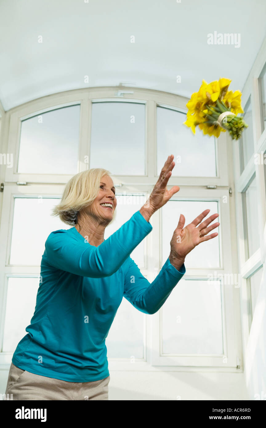 Man throwing flowers hi-res stock photography and images - Alamy