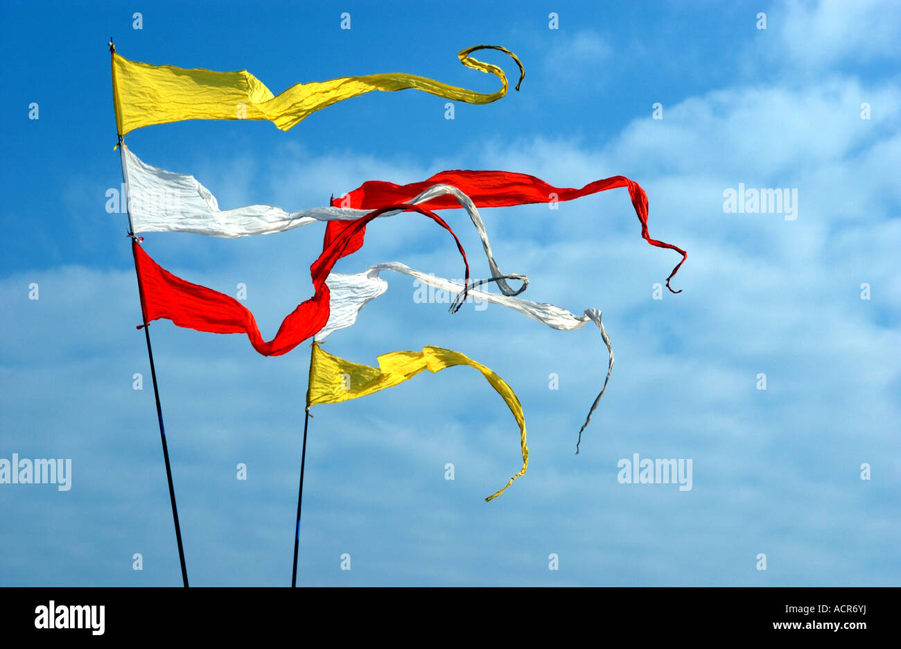 Colourful streamers blowing in the wind along Brighton seafront UK ...