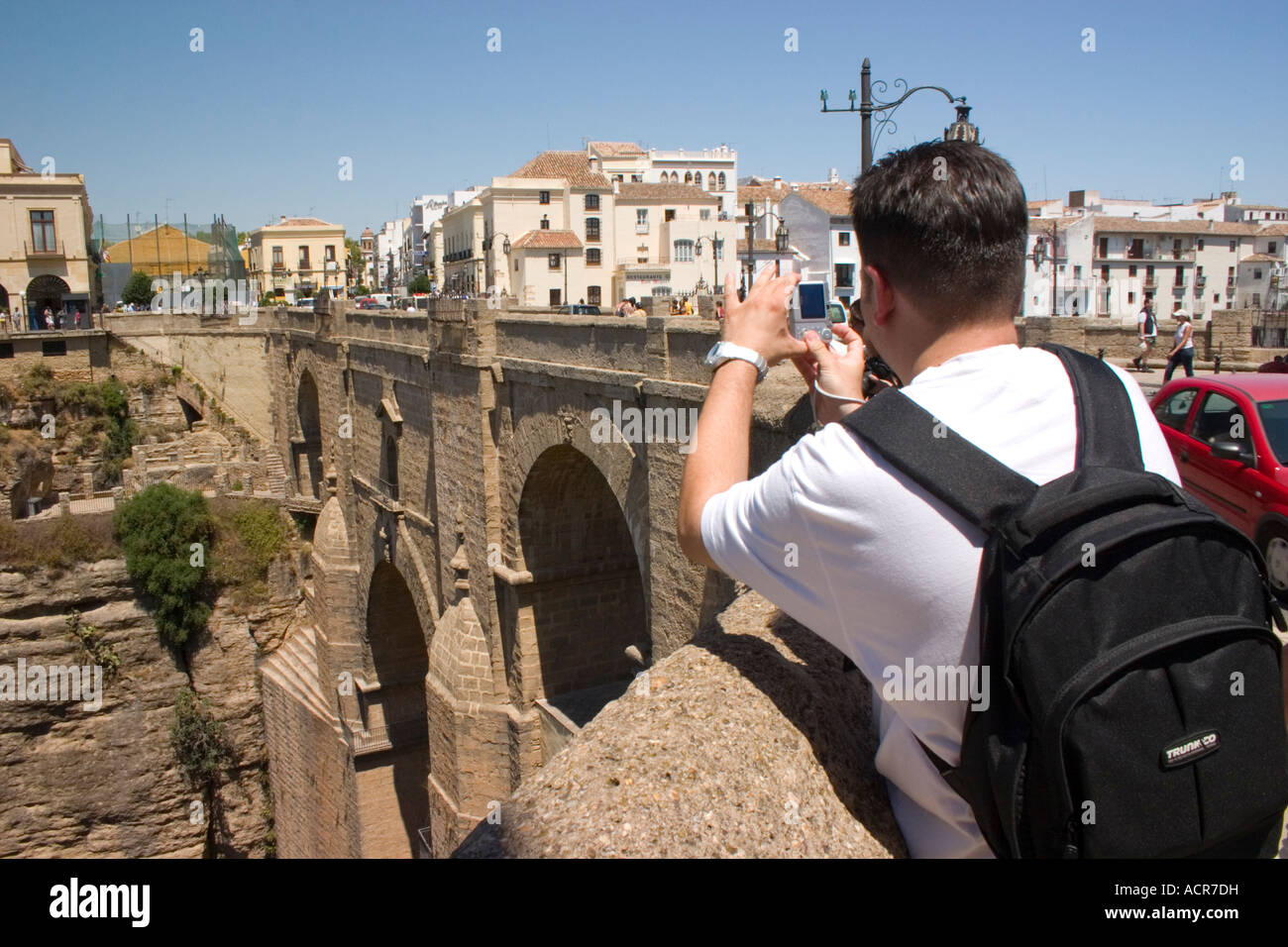 Tourist taking photo of Puente Nuevo ( New Bridge ) At Ronda , Spain ...