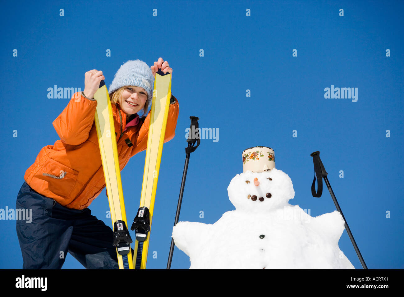 Snowman holding skis hi-res stock photography and images - Alamy