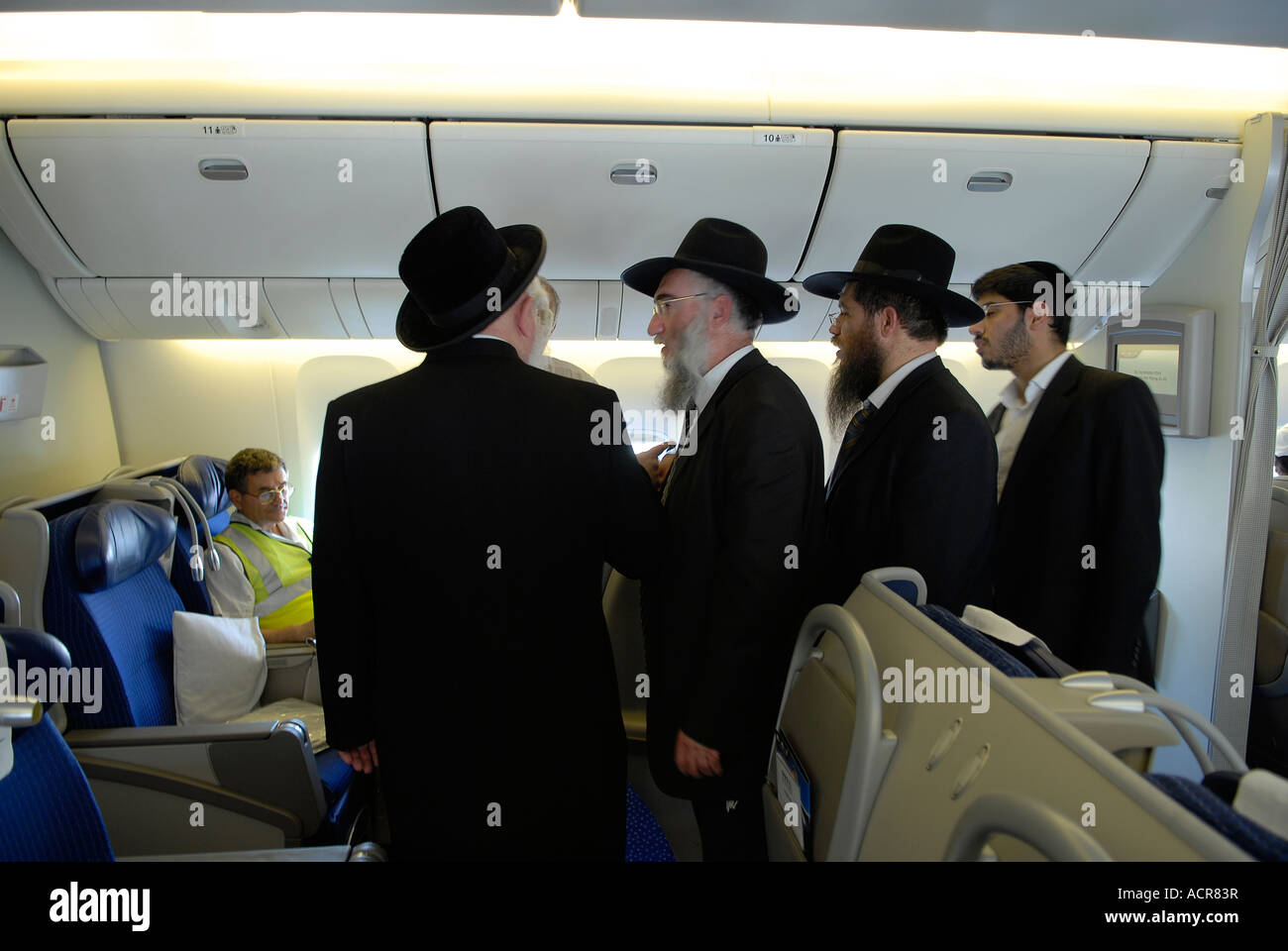 Ultra orthodox Jews Passengers inside El Al airplane Stock Photo - Alamy