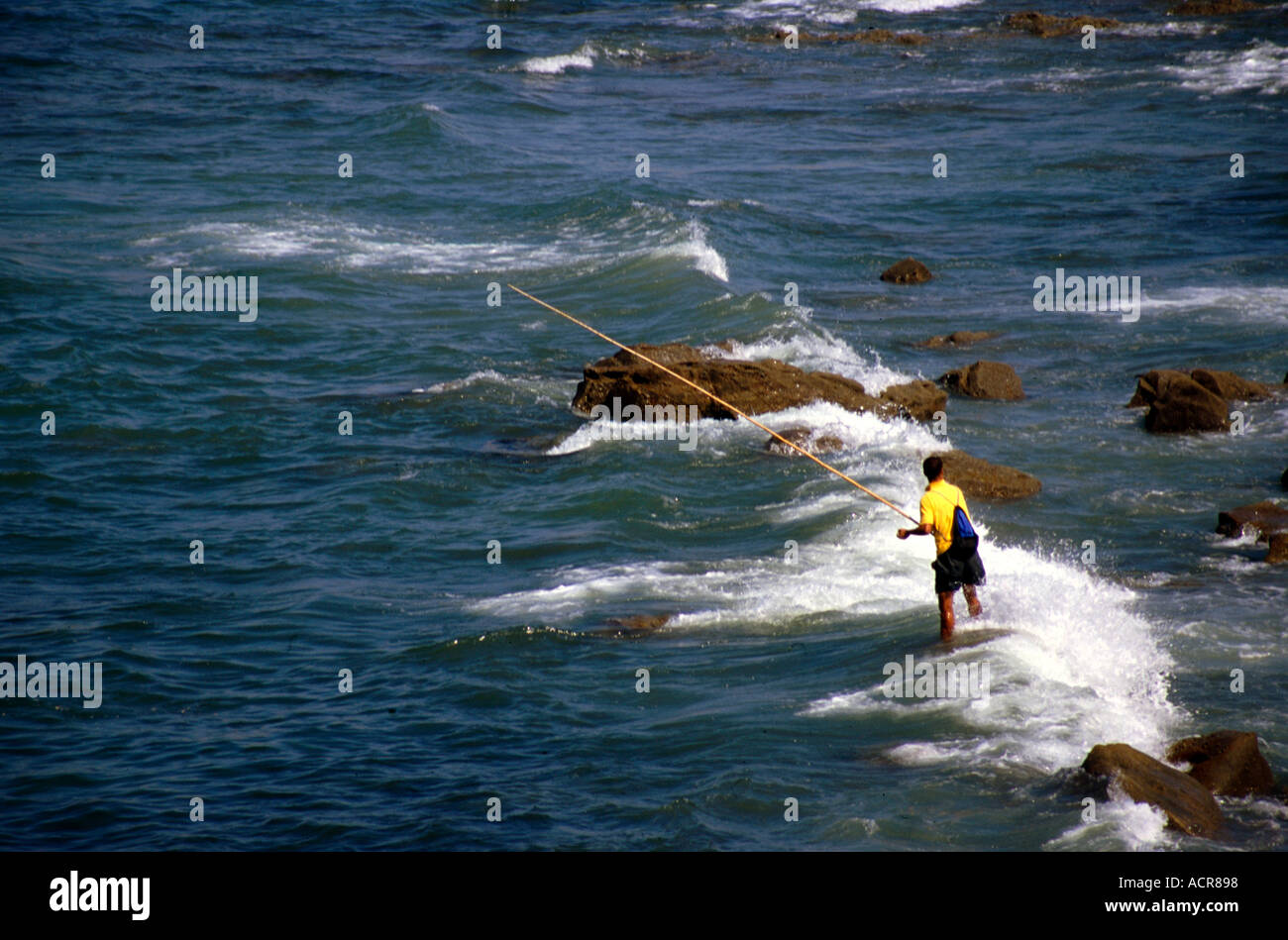dude fishing at asilah Morocco Asilah Stock Photo - Alamy