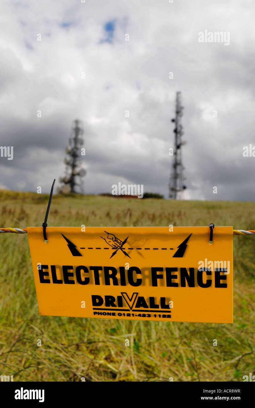 Communications mast and electric fence on top of Eddisbury Hill ...