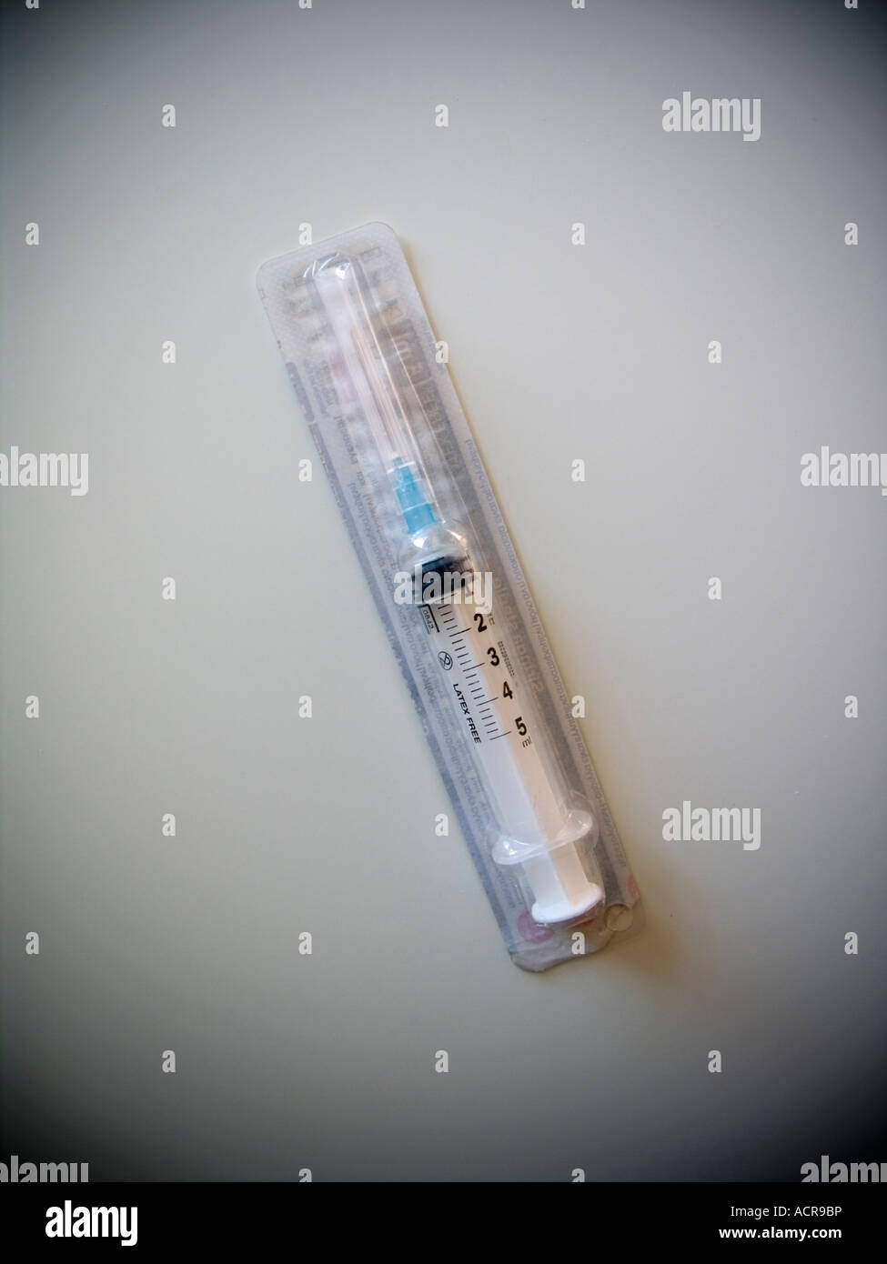 syringe on a white background Stock Photo - Alamy