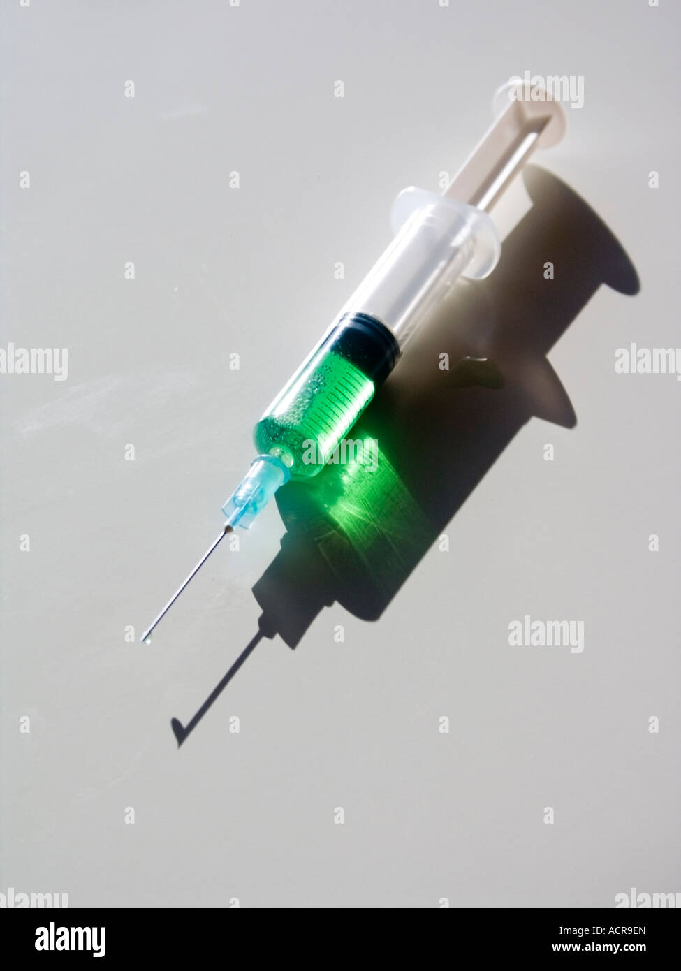 syringe on a white background Stock Photo - Alamy
