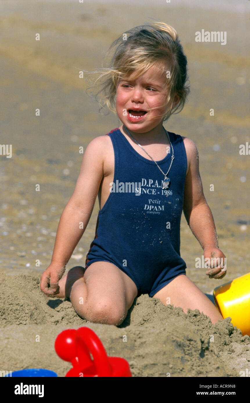 Baby Crying Beach High Resolution Stock Photography and Images - Alamy