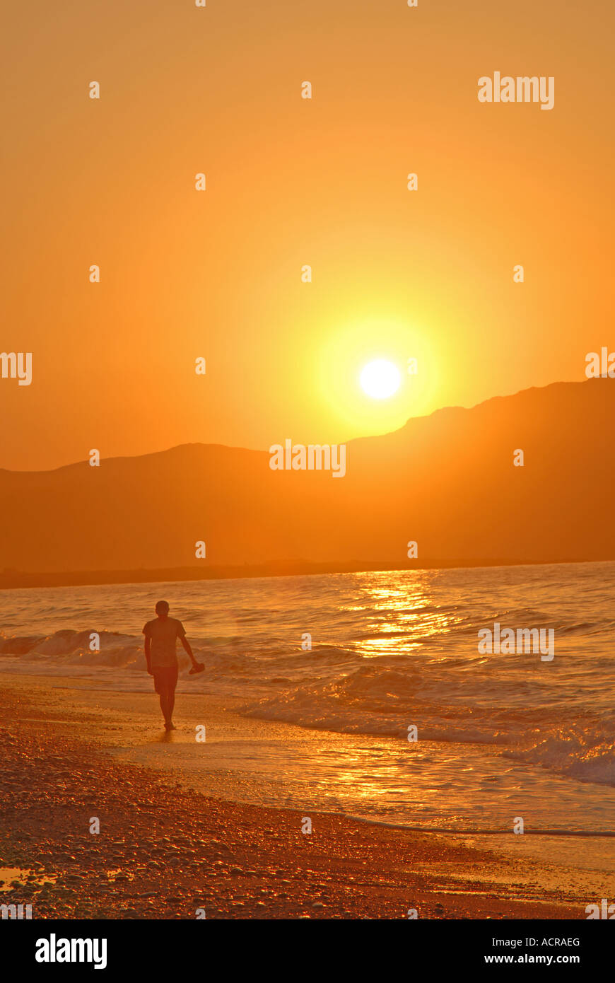 CRETE Sunset over the Rodhopou Peninsula seen from Maleme beach near ...