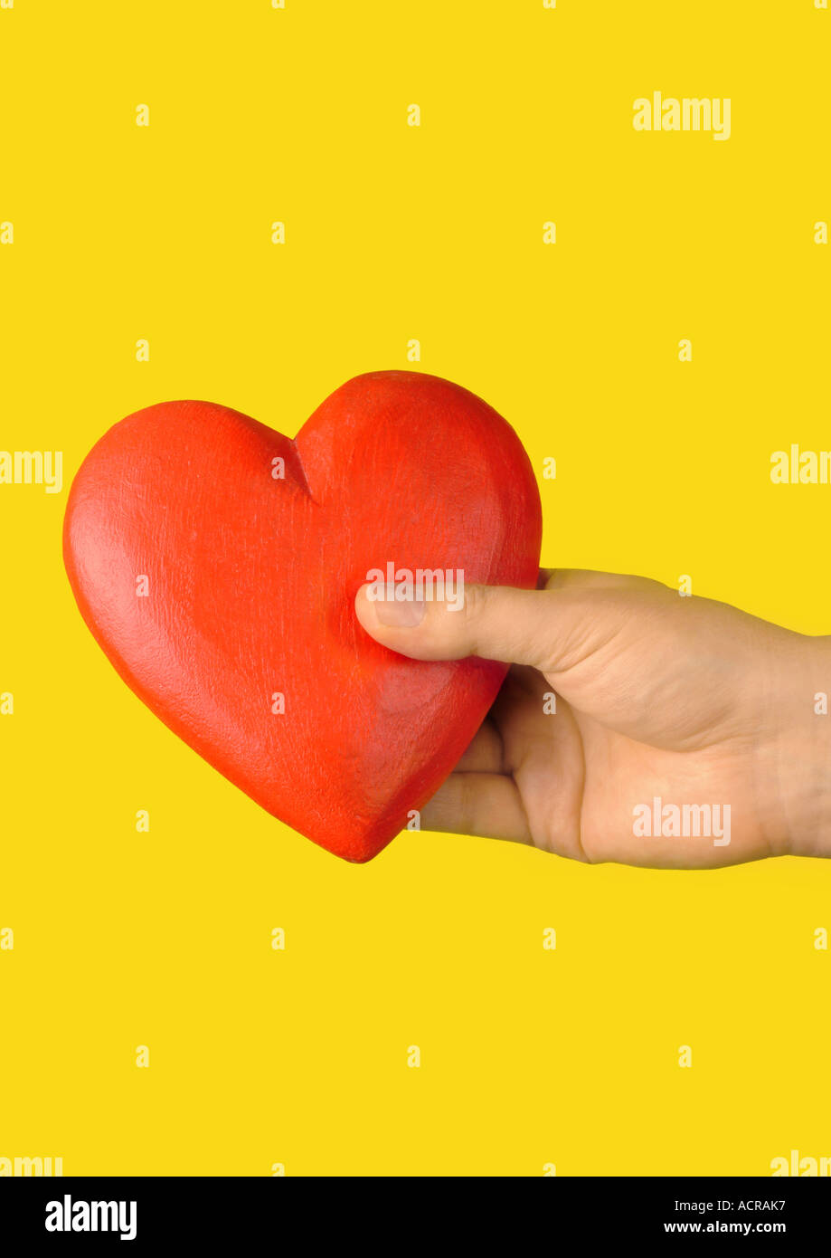 Hand in heart symbol hi-res stock photography and images - Alamy