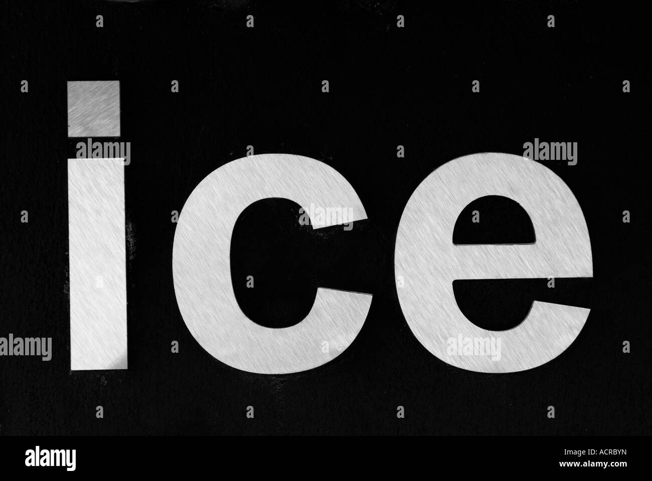 ice Sign with silver letters and black background Stock Photo - Alamy