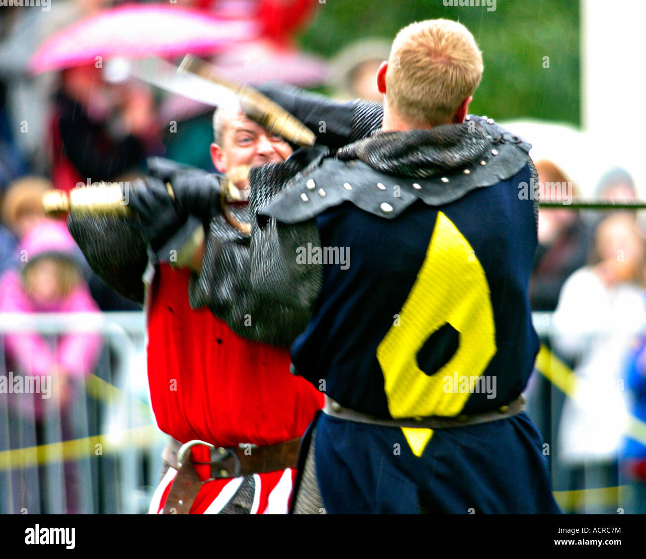 re-enactor men at arms fighting a duel using broad swords 22nd October ...
