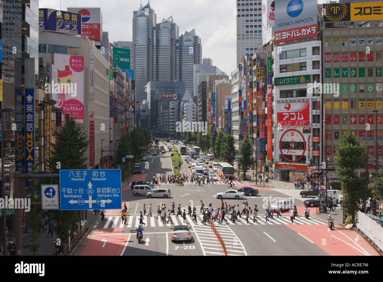 Koshu-kaido Avenue at the south exit of Shinjuku Station with the Park ...