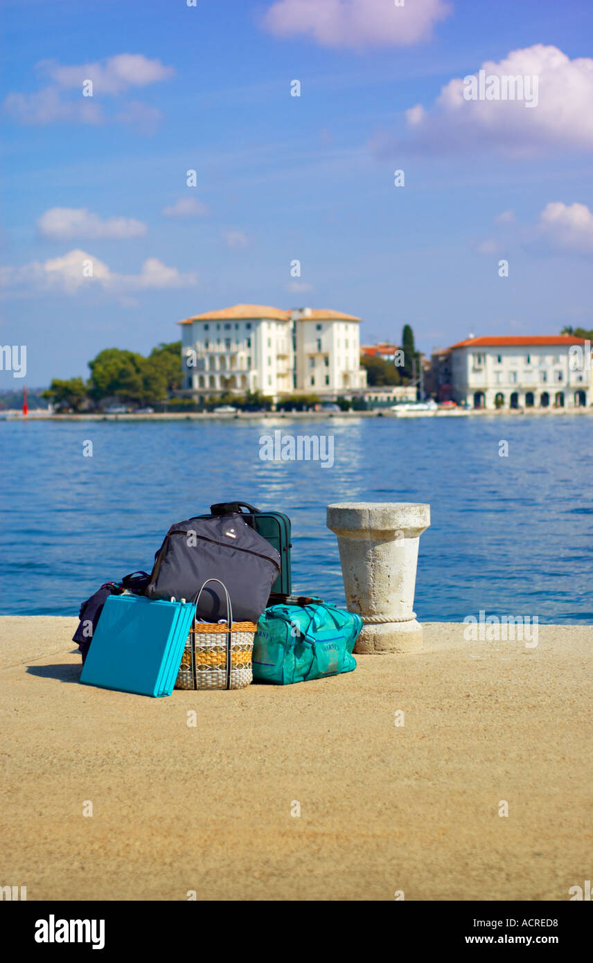 Luggage on harbour side Stock Photo - Alamy