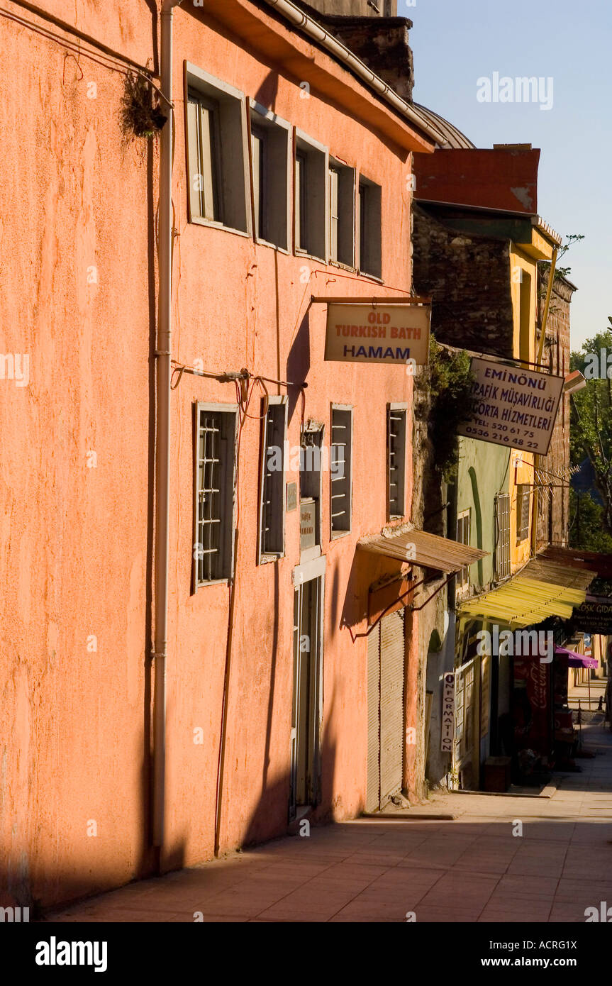 Beautifully lit back street of Istanbul, showing signs for Hamam ...