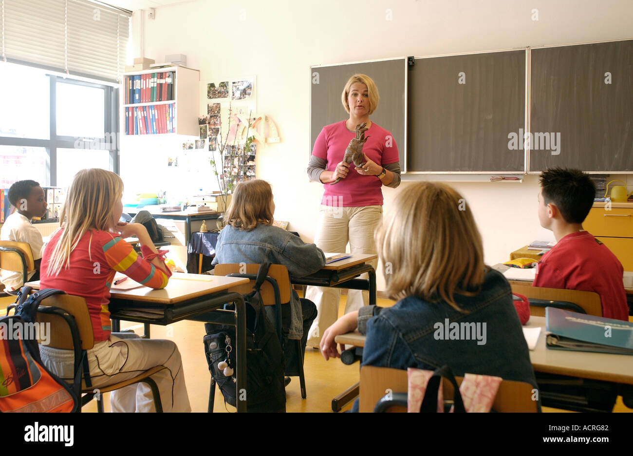Students in classroom of primary school Stock Photo - Alamy
