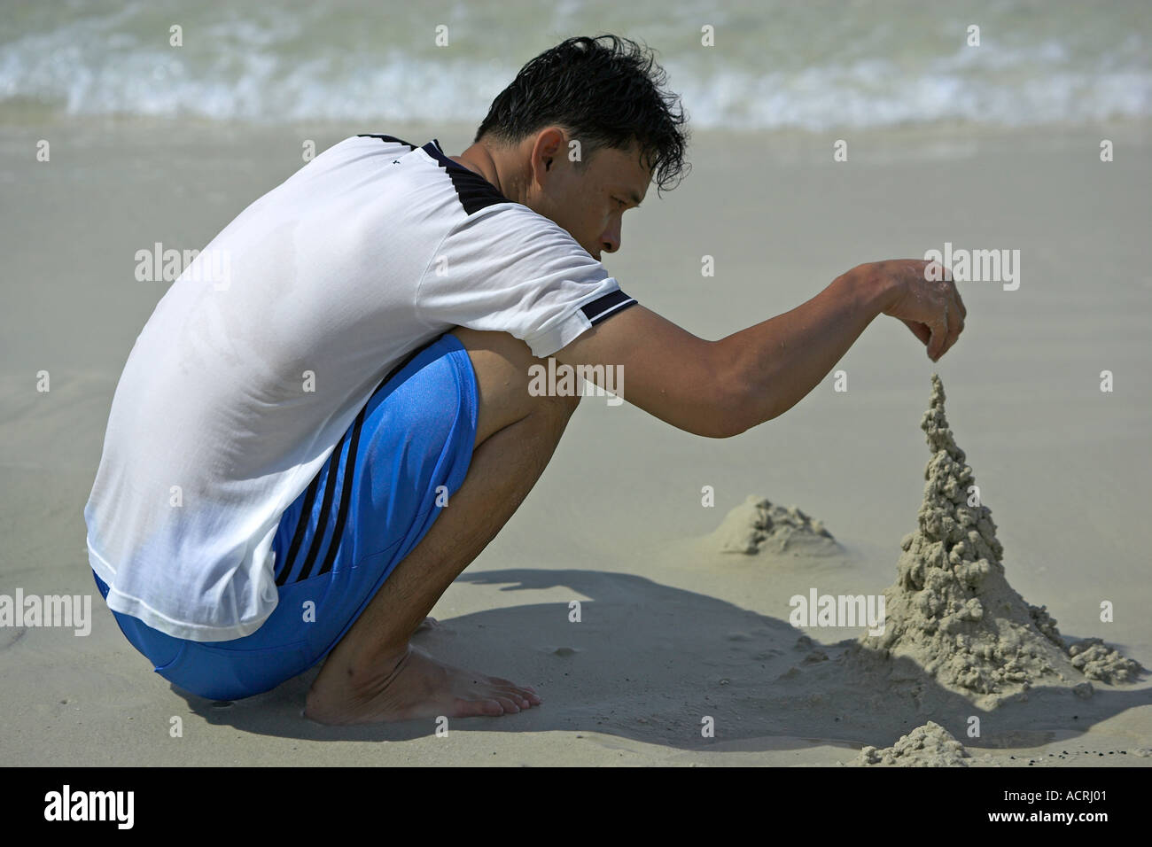 Builds sand castle hi-res stock photography and images - Alamy