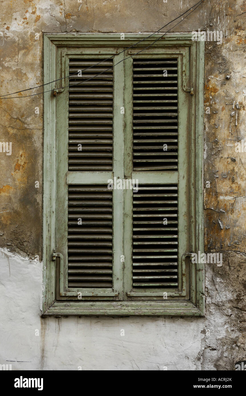 Old shuttered shabby wooden window Stock Photo - Alamy