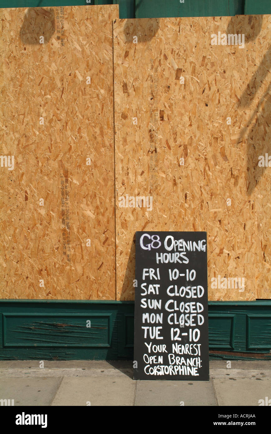 Boarded up shop front in hi-res stock photography and images - Alamy