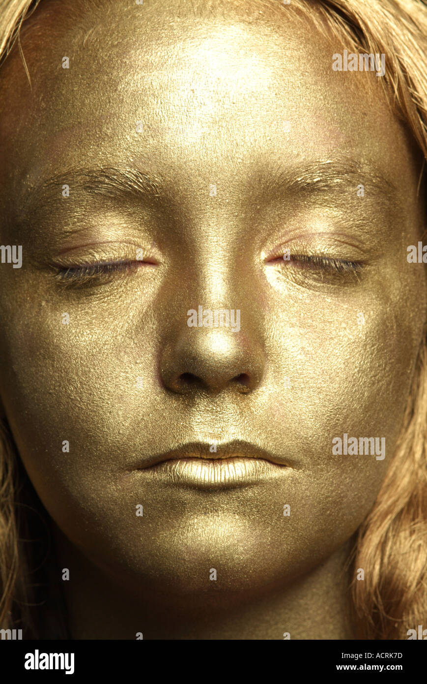 gold face girl Stock Photo - Alamy