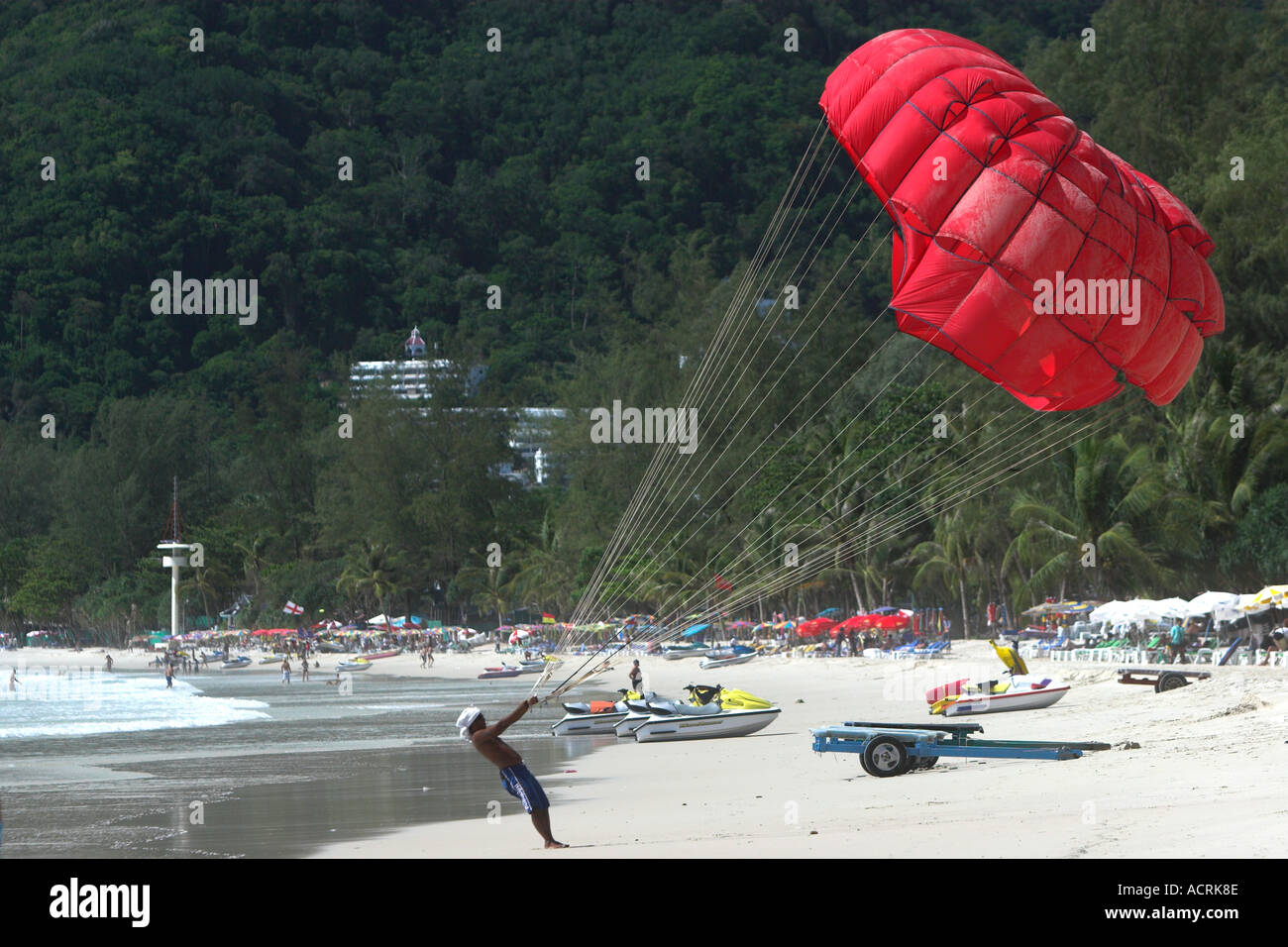 Filling parasail before flight Patong Beach after tsunami Phuket island ...