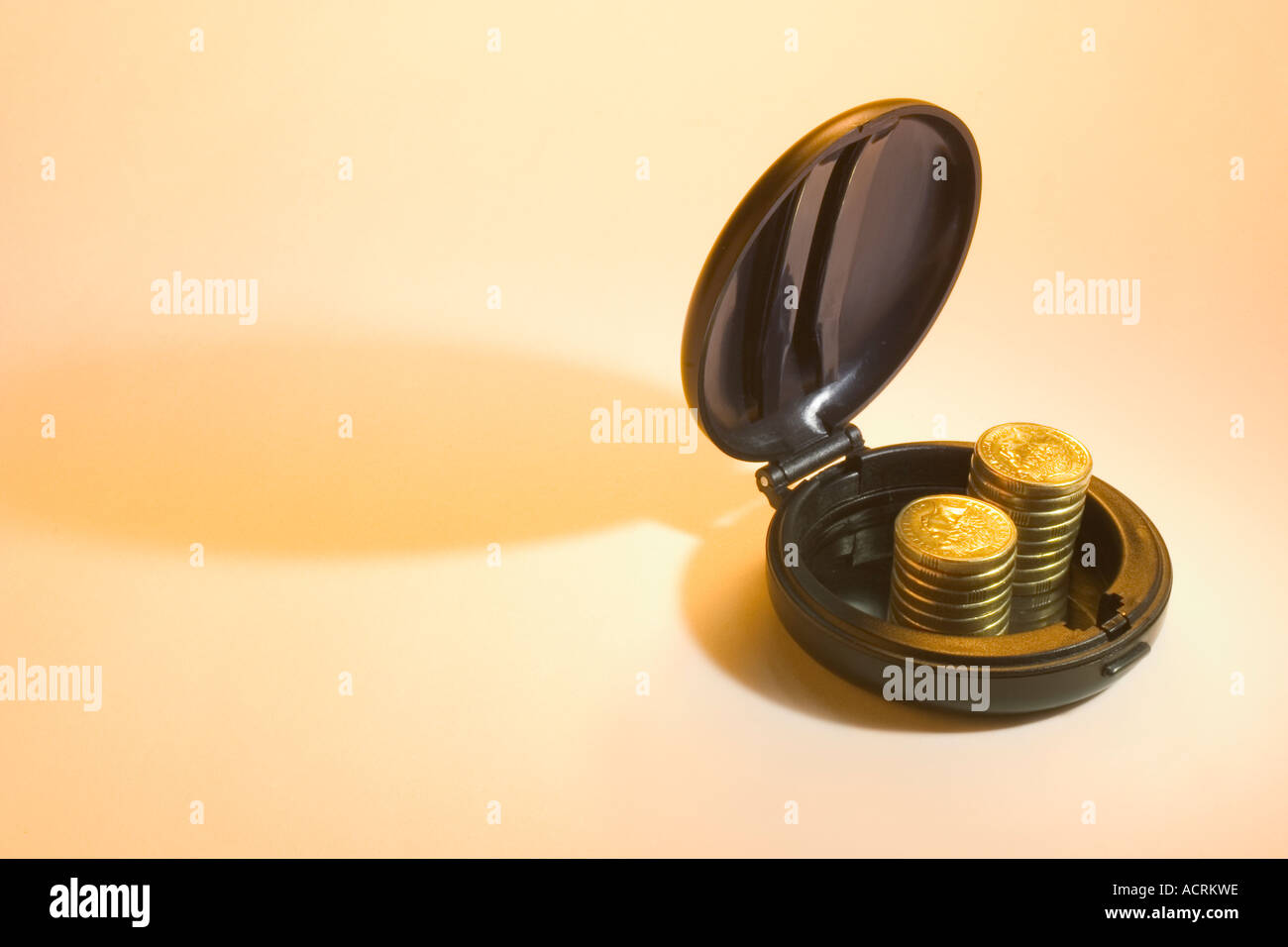 Coins in Compact Case Stock Photo - Alamy