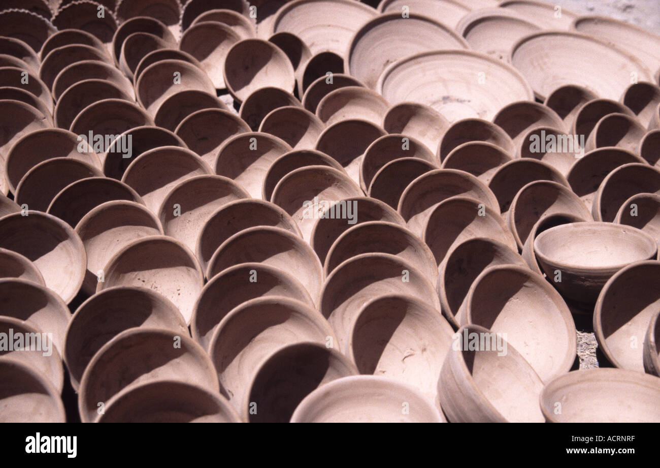 Pottery drying in sun, Morocco Stock Photo - Alamy