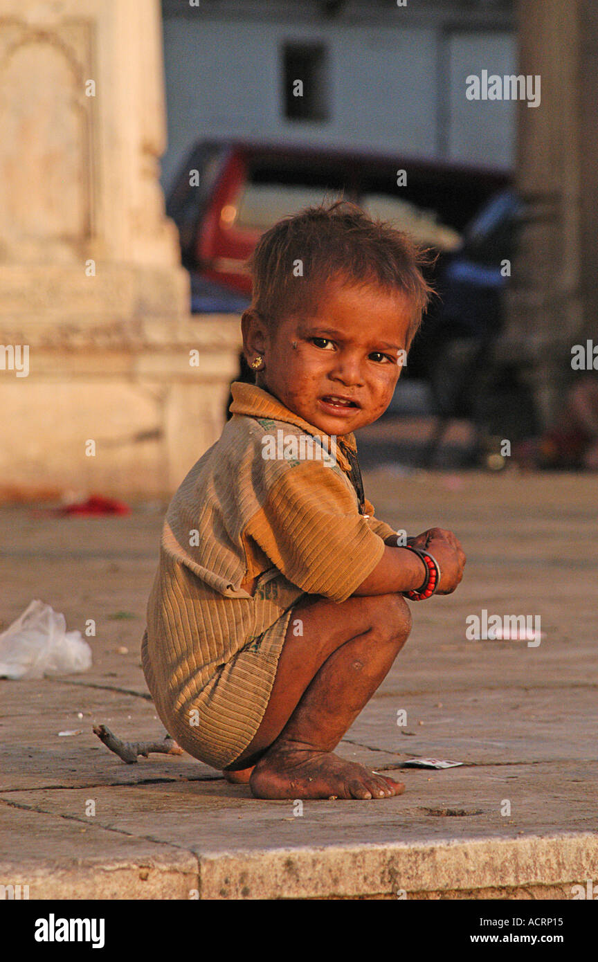 A homeless Roma or gypsy boy near the ghats in Udaipur Rajasthan India ...