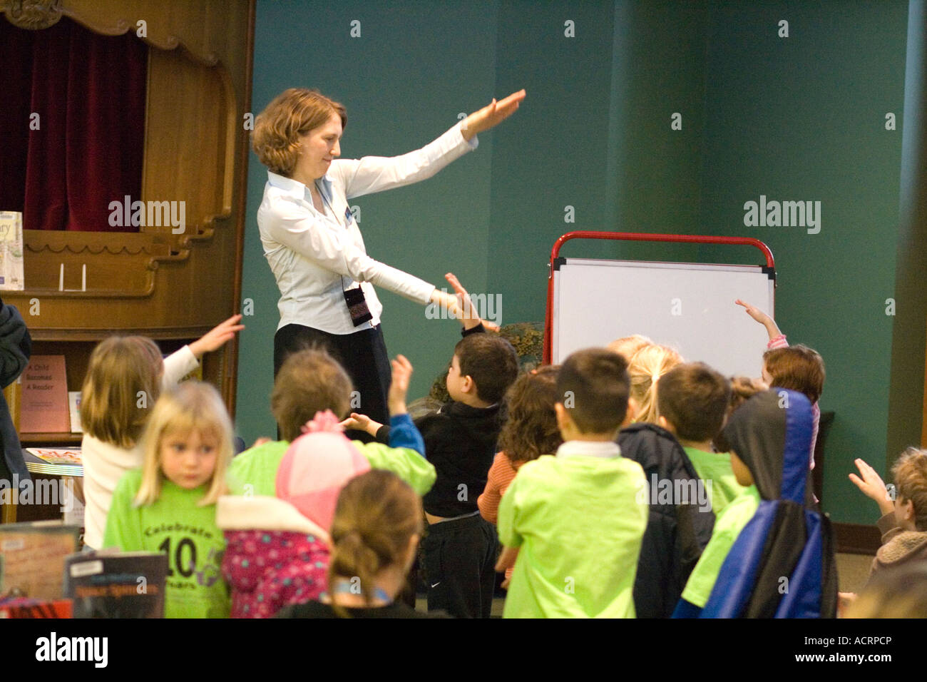 Children age 4 participating in librarians story time. James J. Hill ...