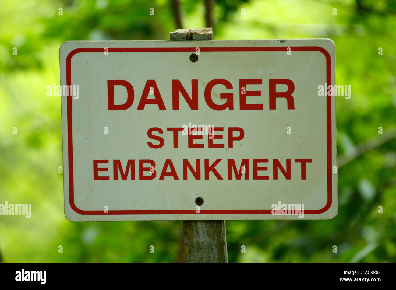 Warning sign Danger Steep Embarkment Stock Photo - Alamy