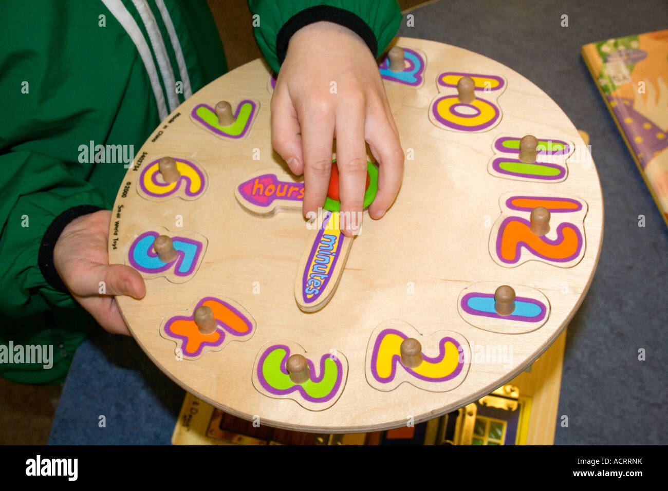 Learning to tell time with a manual clock at the library. James J. Hill ...
