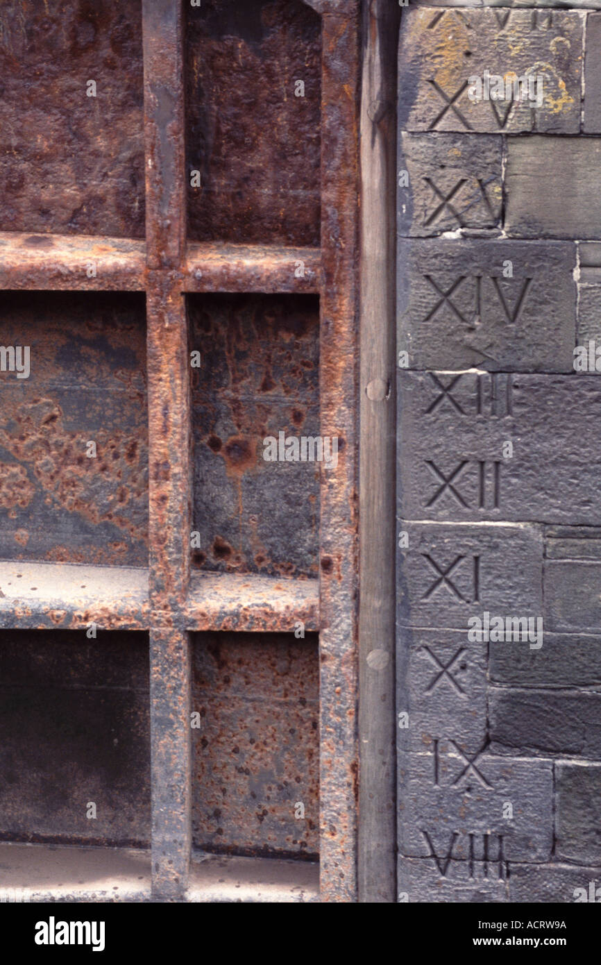 Rusty metal lock gates with roman numerals depth markers Stock Photo ...
