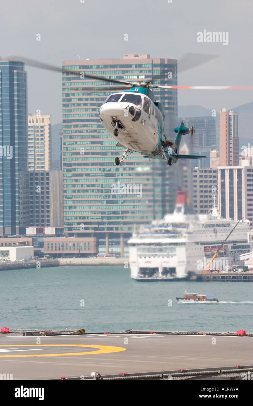 HeliJet Express helicopter lands or take off at heliport shun tak ...