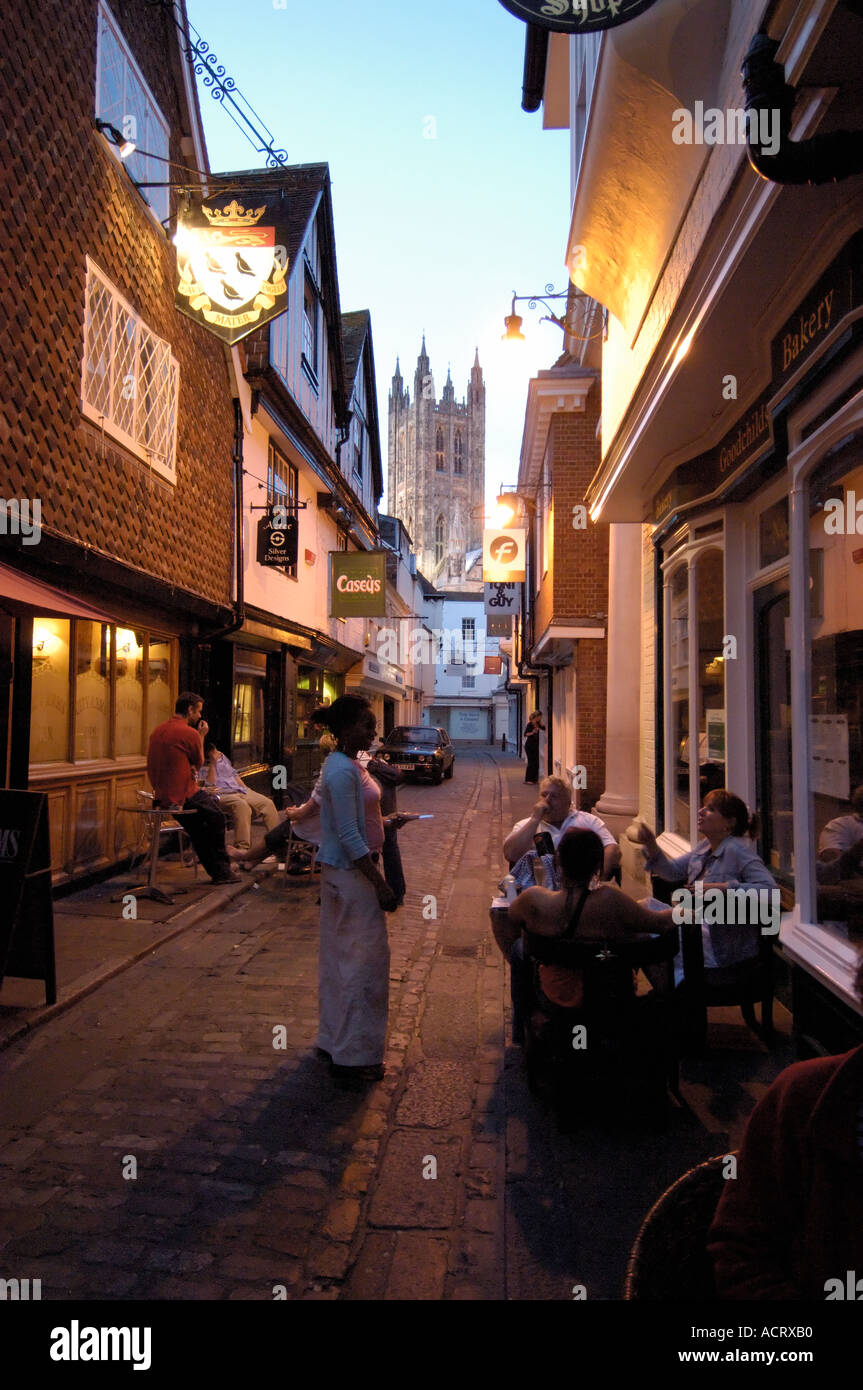 Street restaurant and tower of Cathedral Canterbury Kent England Stock ...