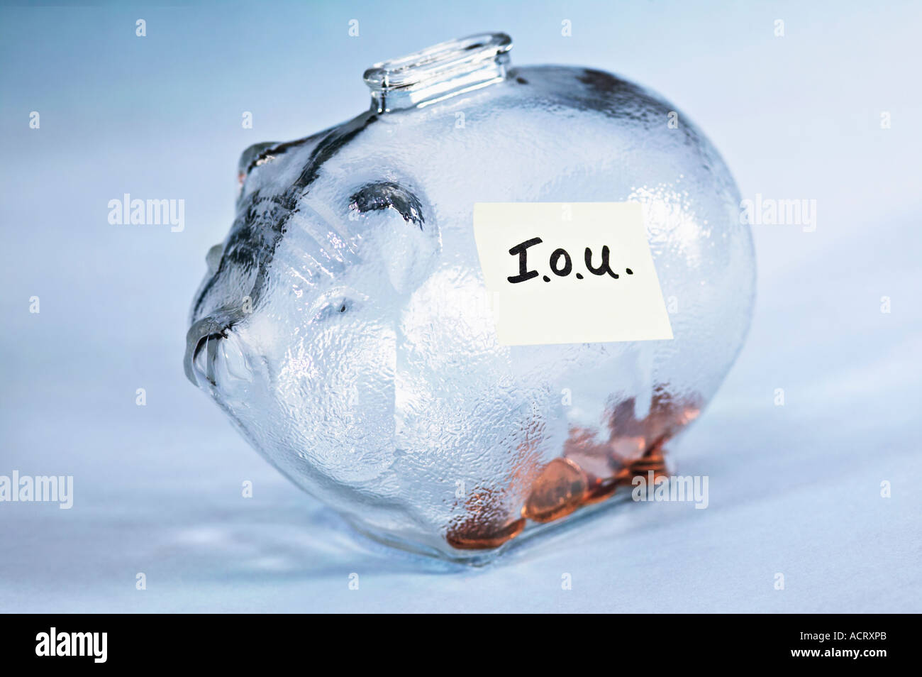 IOU sign on nearly empty piggy bank Stock Photo - Alamy