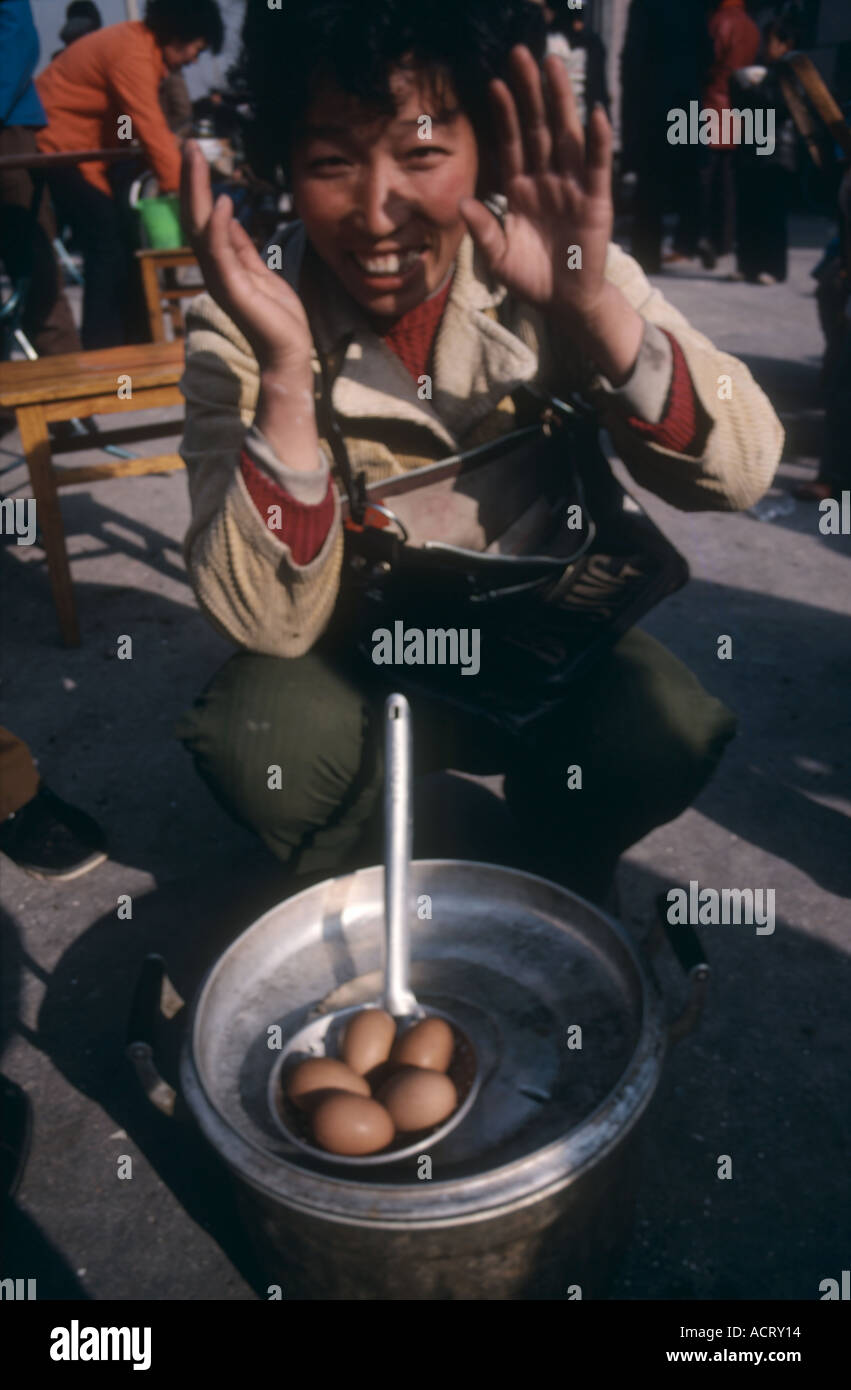 Selling eggs in a market in Beijing China Stock Photo - Alamy