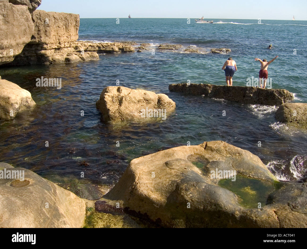 Boy diving rock hi-res stock photography and images - Alamy