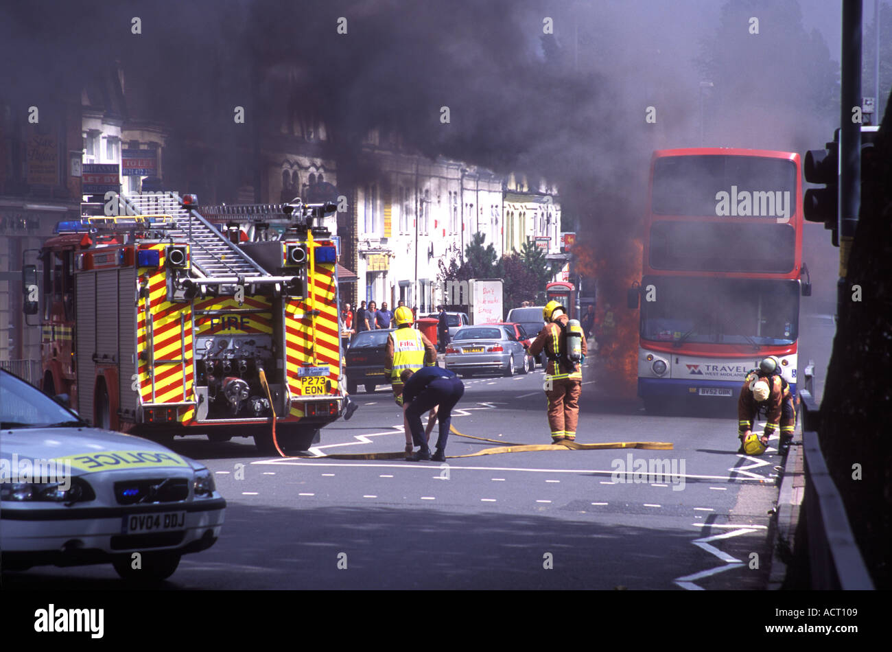 Fire engine at bus fire Stock Photo - Alamy