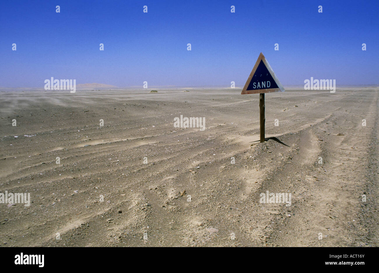 Road sign in desert warning against wind blown sandstorms in the ...