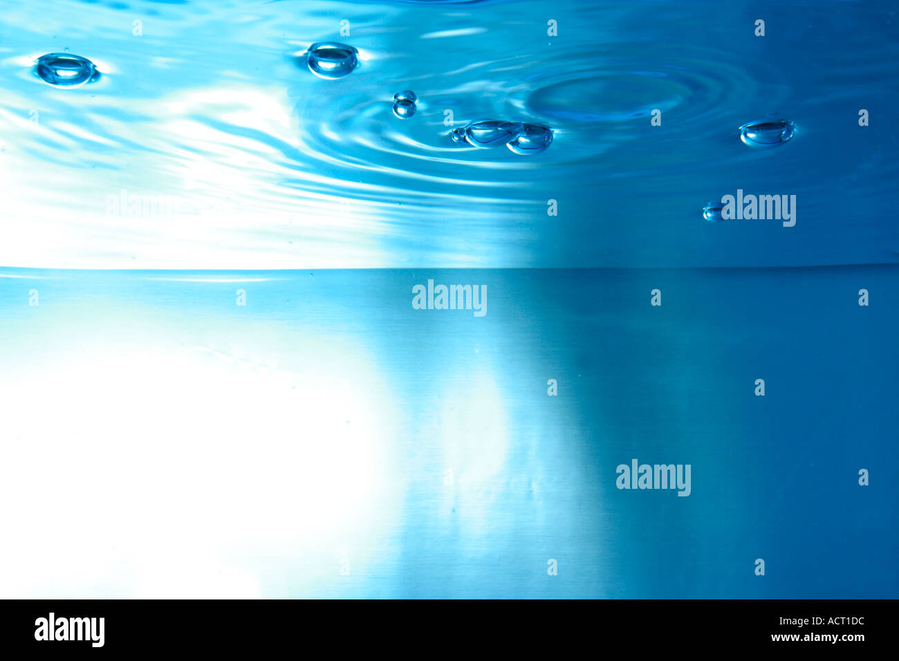 water surface seen from underwater with bubbles Stock Photo - Alamy