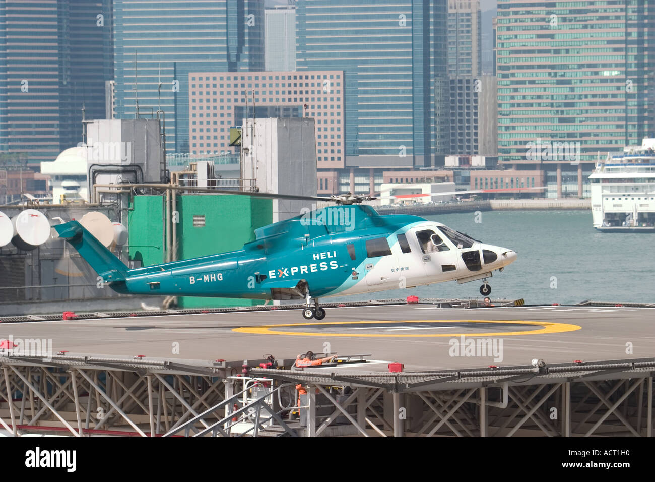 HeliJet Express helicopter lands or take off at heliport shun tak ...