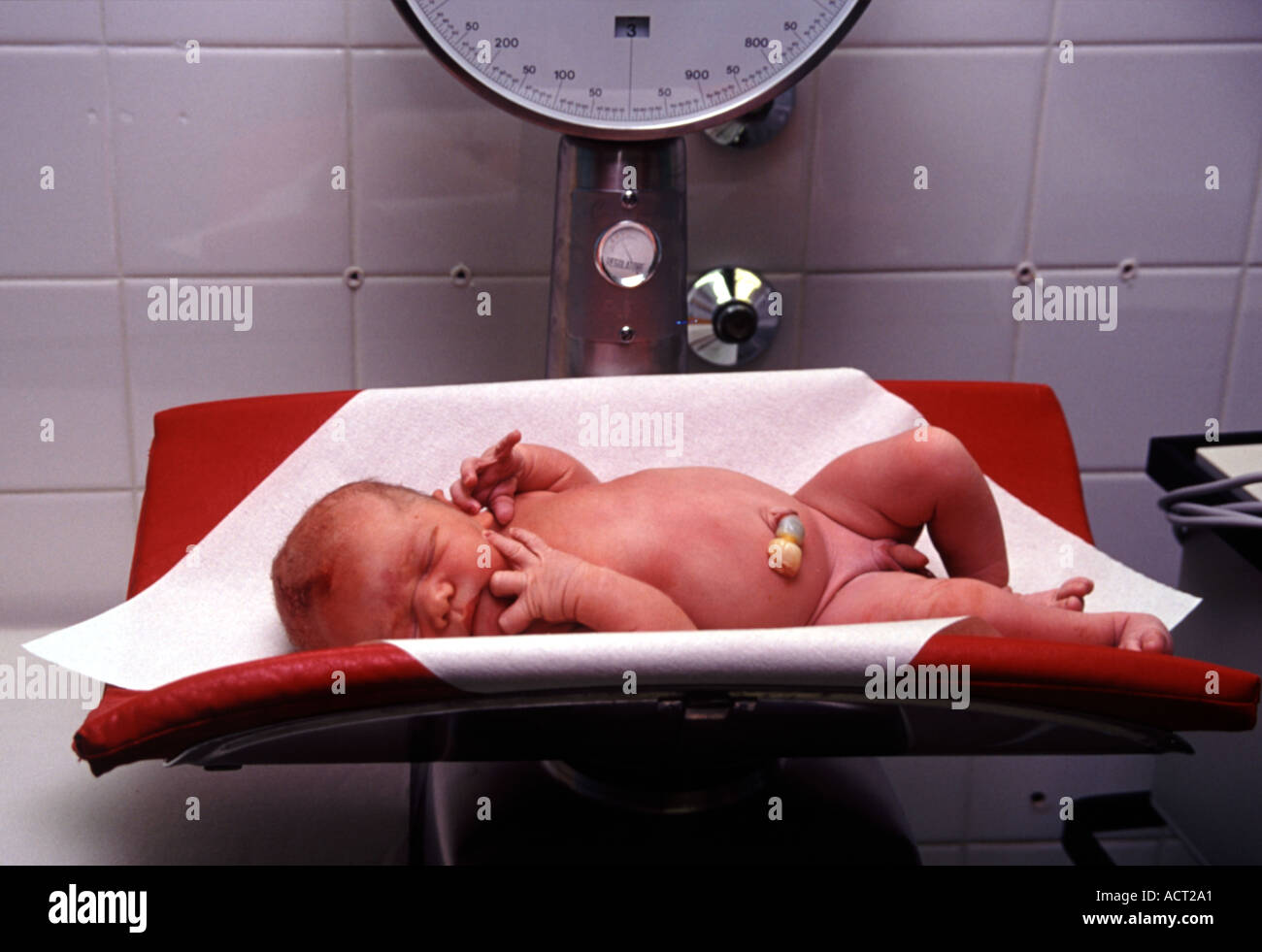 Baby weighed hospital hi-res stock photography and images - Alamy